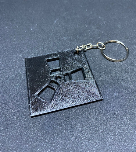 Chaveiro Preto Logo de Rust | Autentic Miniaturas