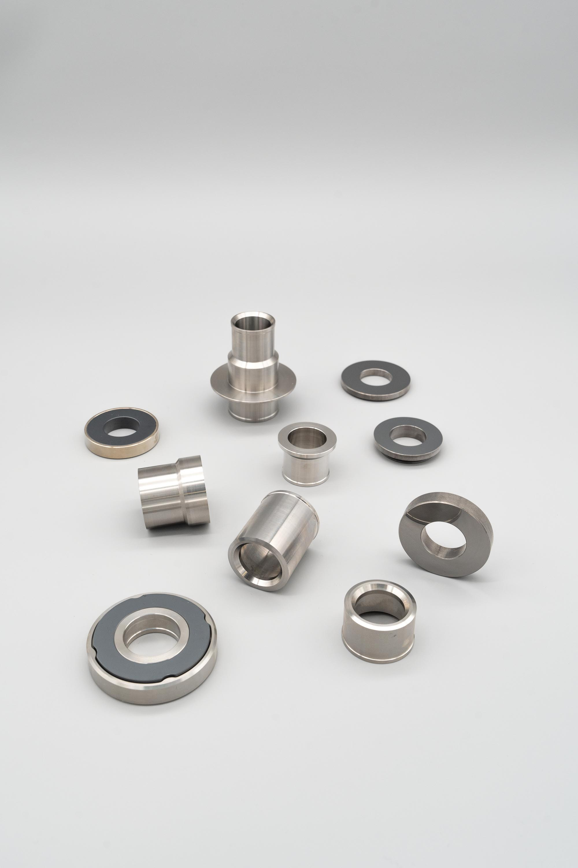 Shaft sleeves and rotating seal rings