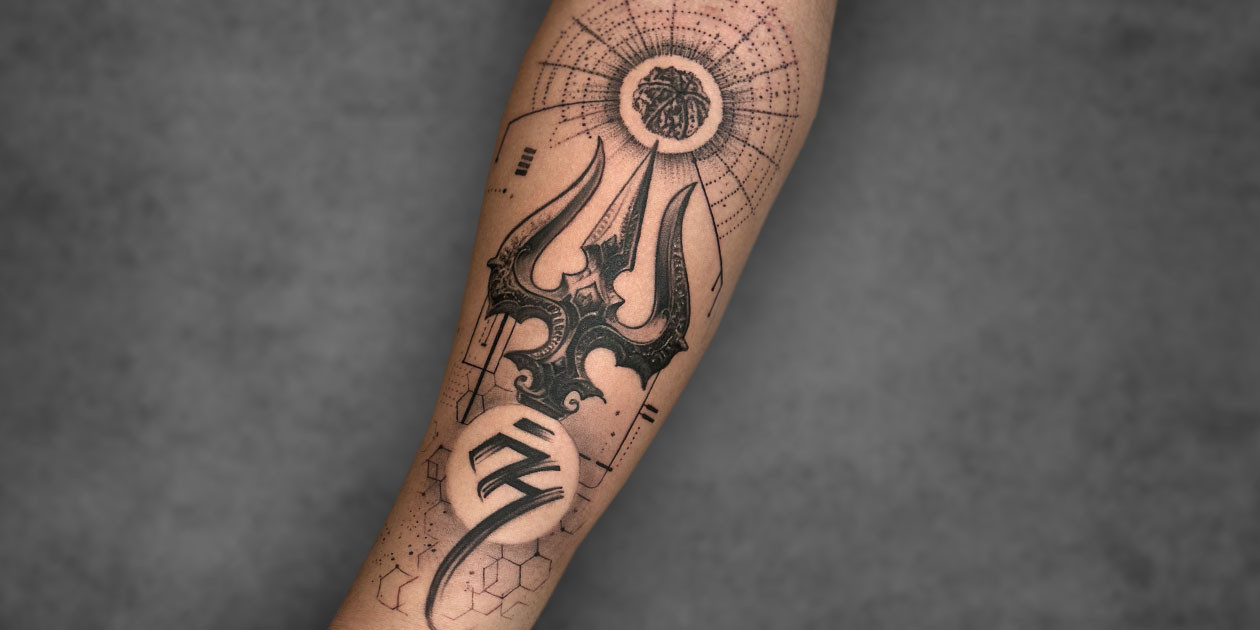 Reclaim the strength of the Trishul with a powerful tattoo