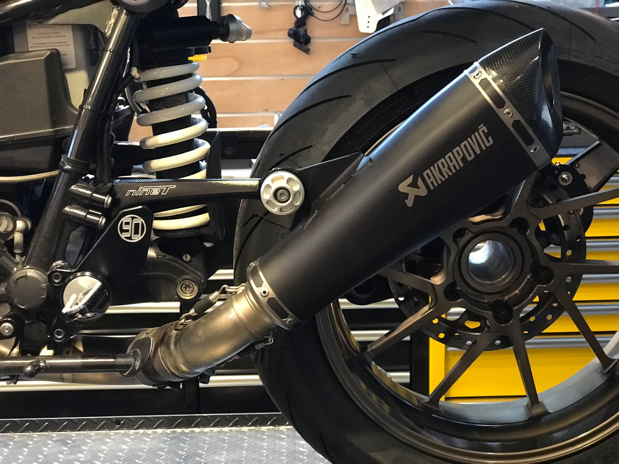 DKdesign - BMW RnineT CNC Exhaust Hanger | DKdesign Accessories