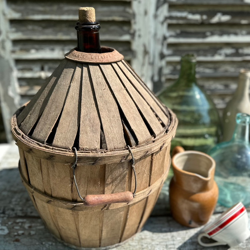 Large rare amber French demijohn in its original case | Quintessentially Fr