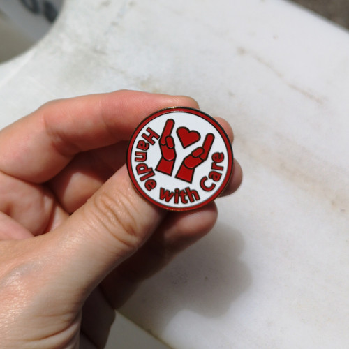 Handle With Care Pin Badge | Blackdot Gallery