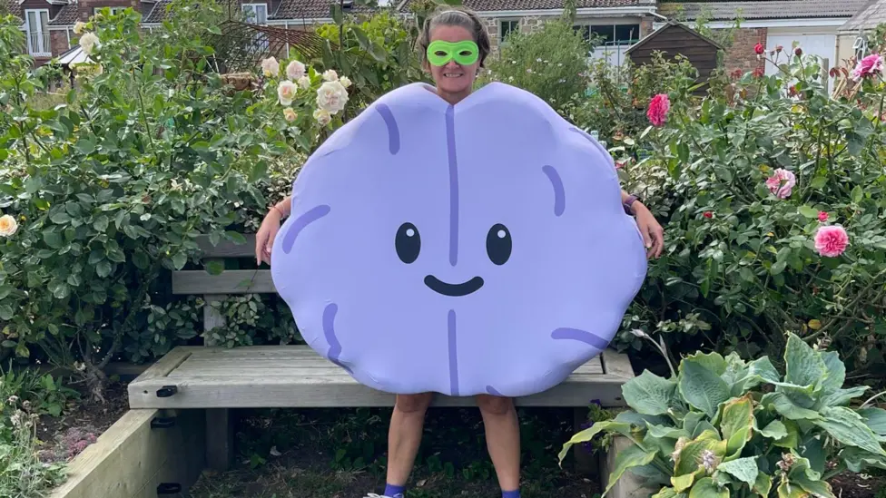Woman set for 15 runs dressed in brain costume