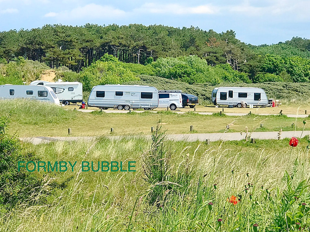 Travellers camp has been set up on National Trust land on Lifeboat Road ...