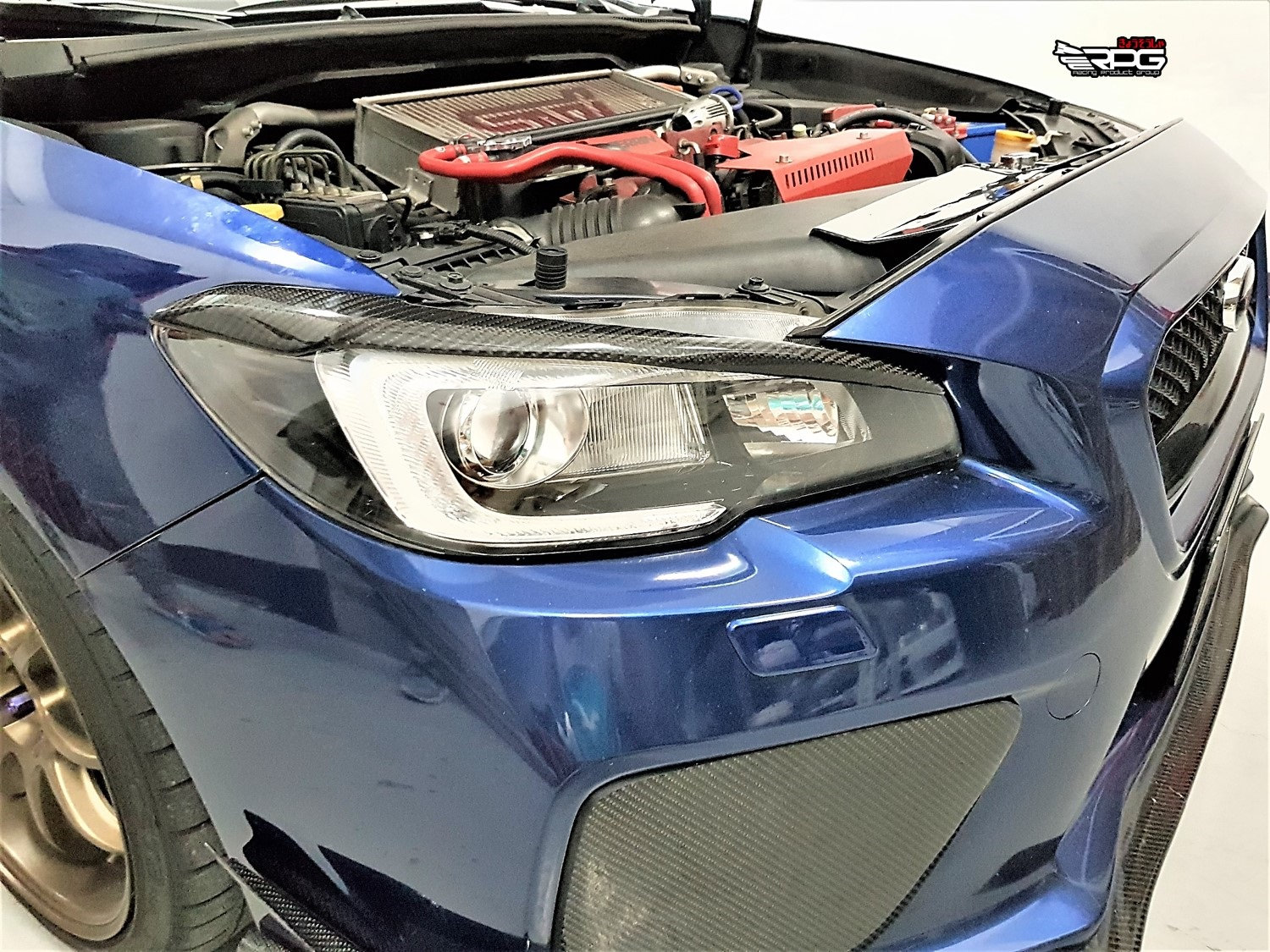 RPG Evoeye Vacuum Carbon Headlight Eyelid | racingproductgroup