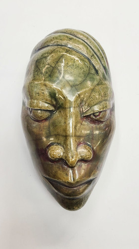 Green Glazed Raku Mask 1 by artist Gene Pearson | Lovetts Fine Art Gallery