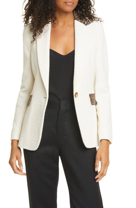 Pairing a colorful blazer with an all black outfit